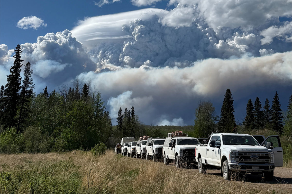 Thousands evacuate as Canadian wildfires spread, impacting air quality ...