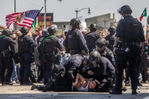 Thousands fill the streets, block freeway in Los Angeles after Trump ...