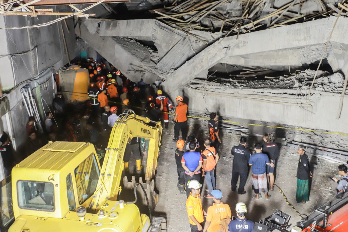 Rescuers rush to help survivors buried in Indonesian school building ...