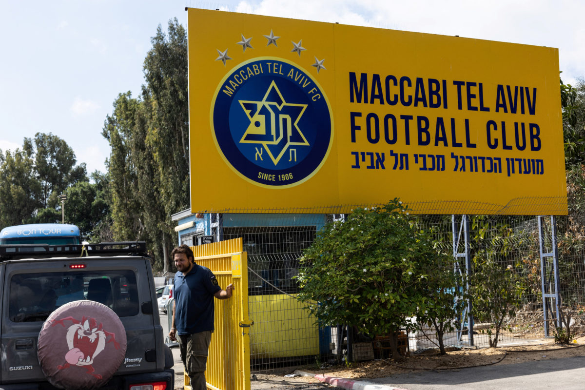 Israeli soccer game abandoned after rioting rival fans throw flares and ...
