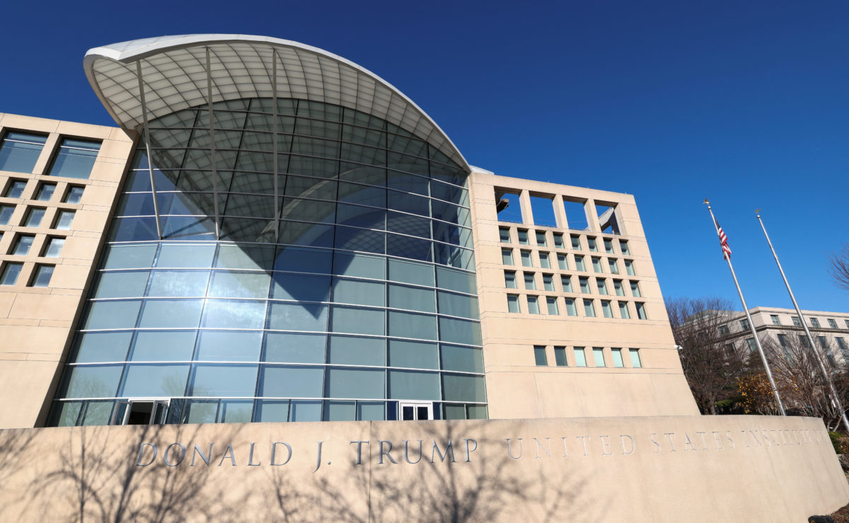 Trump added his name to the U.S. Institute of Peace building while ...